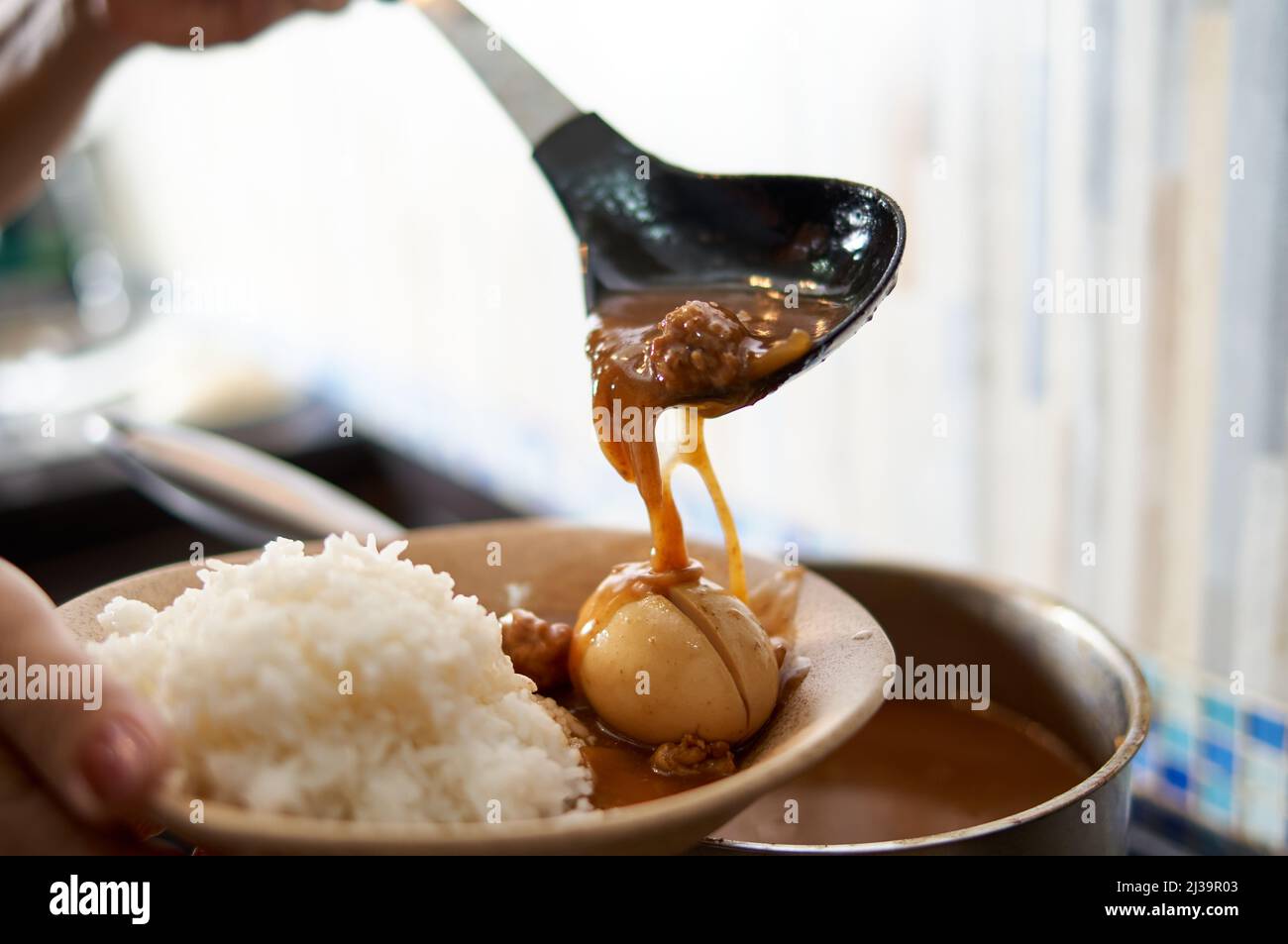 Scooping rice hi-res stock photography and images - Alamy