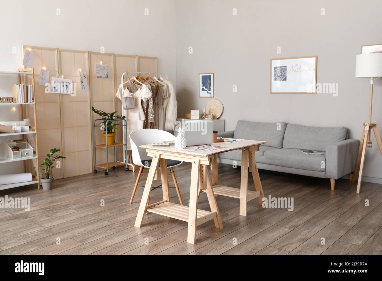 Interior of modern studio of clothes stylist Stock Photo - Alamy