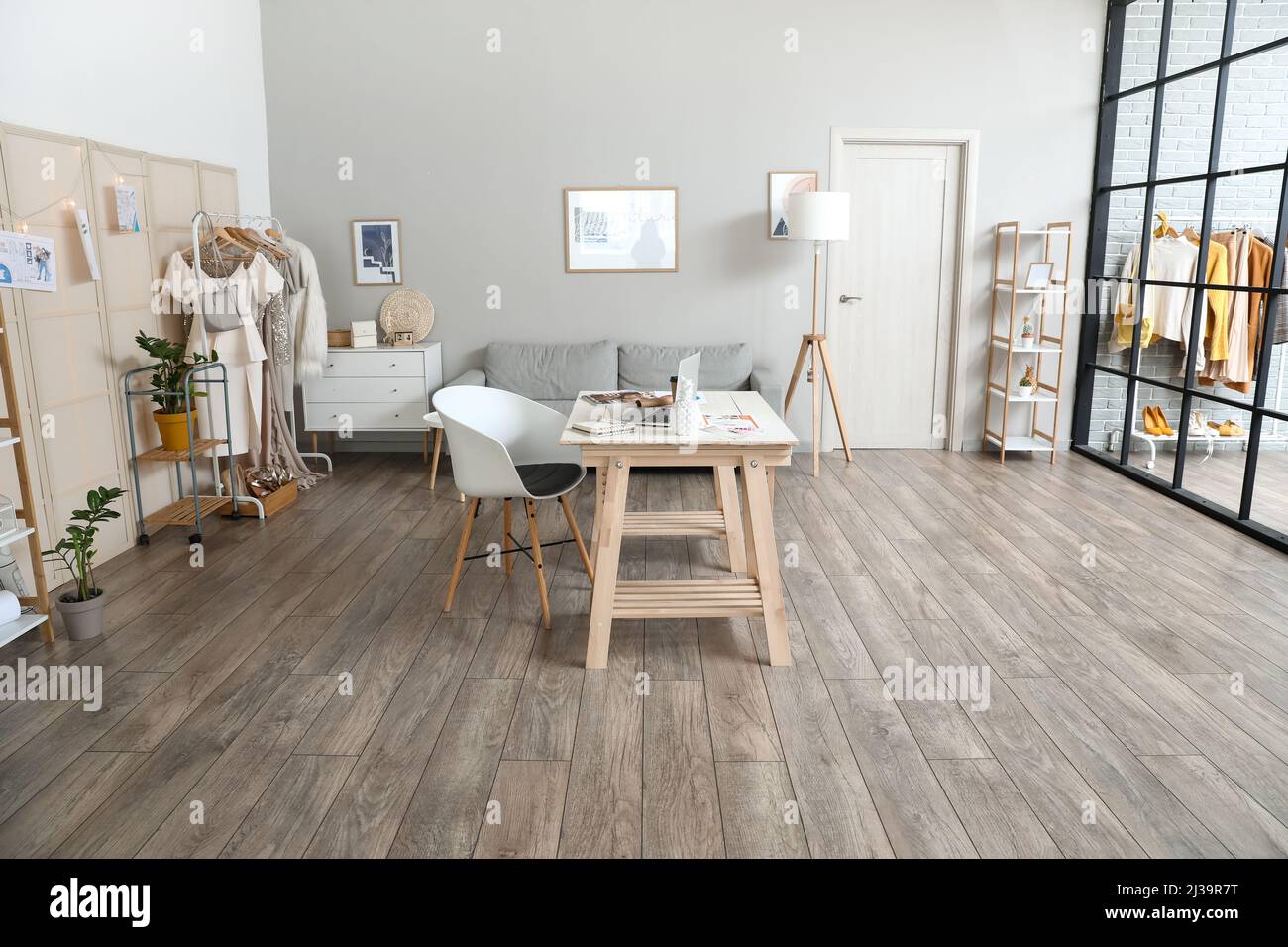 Interior of modern studio of clothes stylist Stock Photo - Alamy