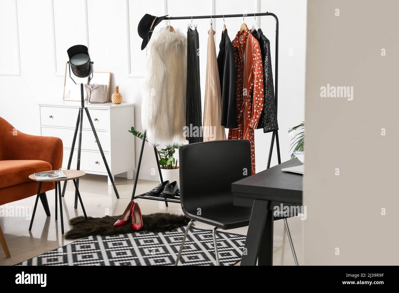 Interior of modern studio of clothes stylist Stock Photo - Alamy