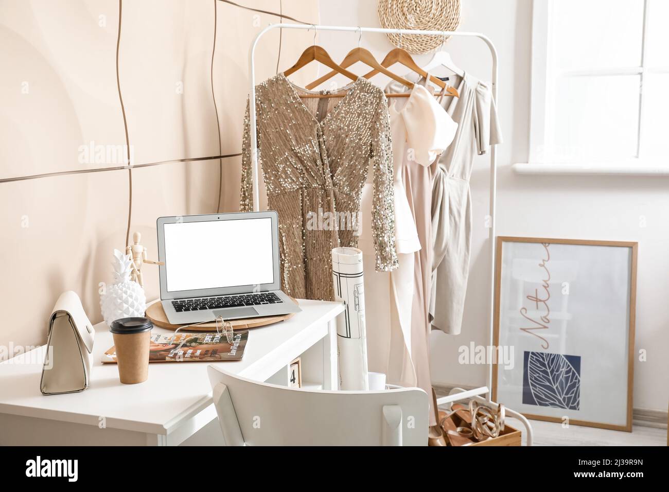 Interior of modern studio of clothes stylist Stock Photo - Alamy