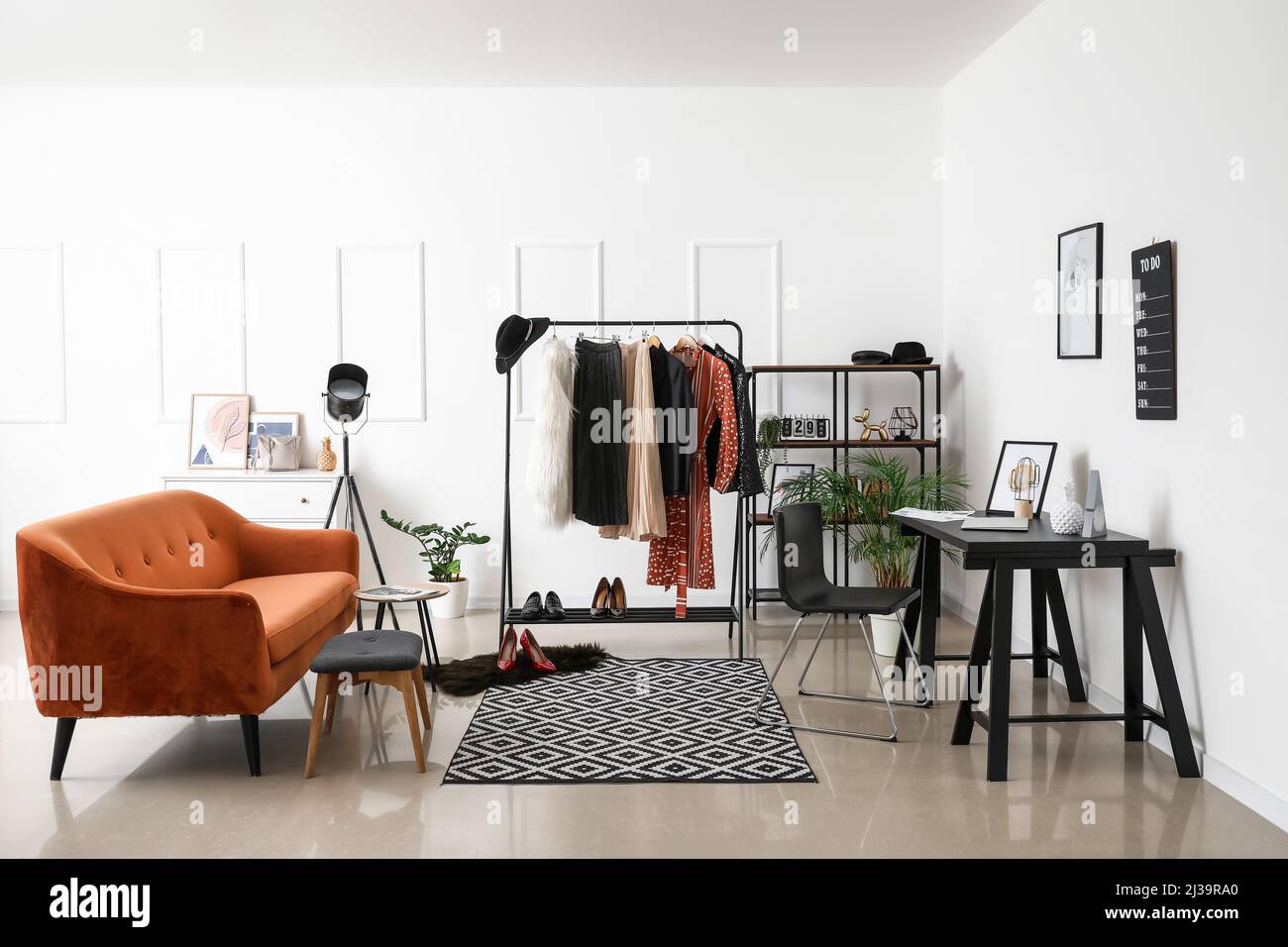 Interior of modern studio of clothes stylist Stock Photo - Alamy