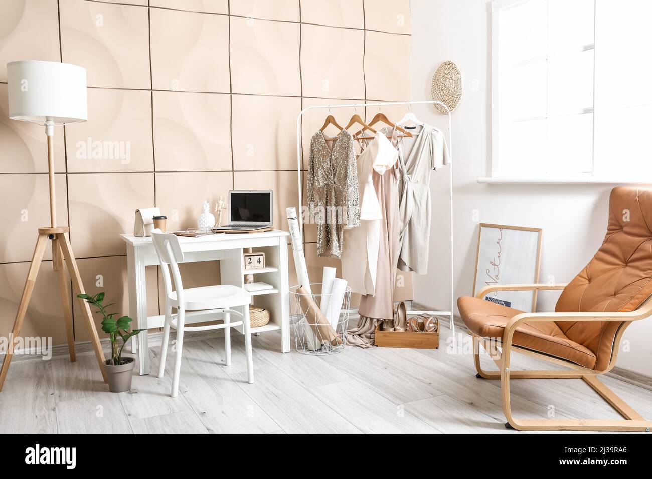 Interior of modern studio of clothes stylist Stock Photo - Alamy