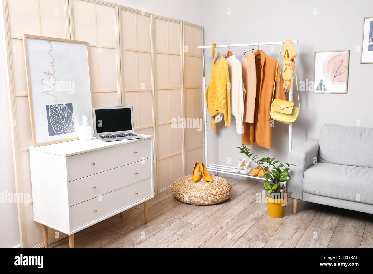 Interior of modern studio of clothes stylist Stock Photo - Alamy