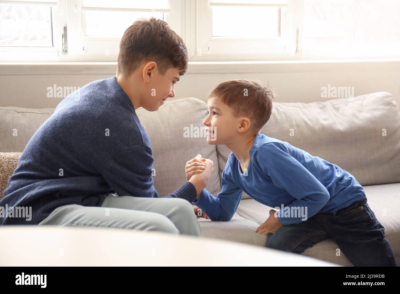 Cute brothers having fun at home Stock Photo - Alamy