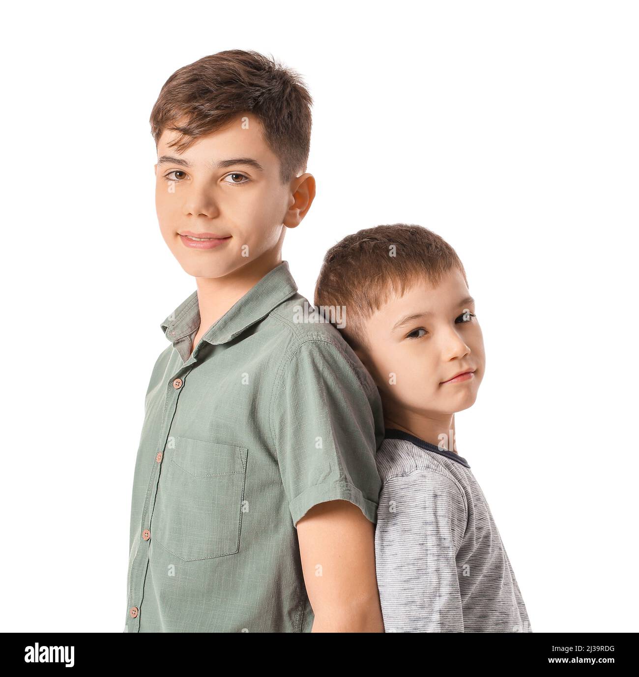 Portrait of cute brothers on white background Stock Photo - Alamy