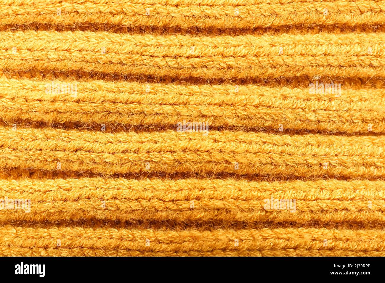 Texture of yellow knitted clothes, closeup Stock Photo - Alamy