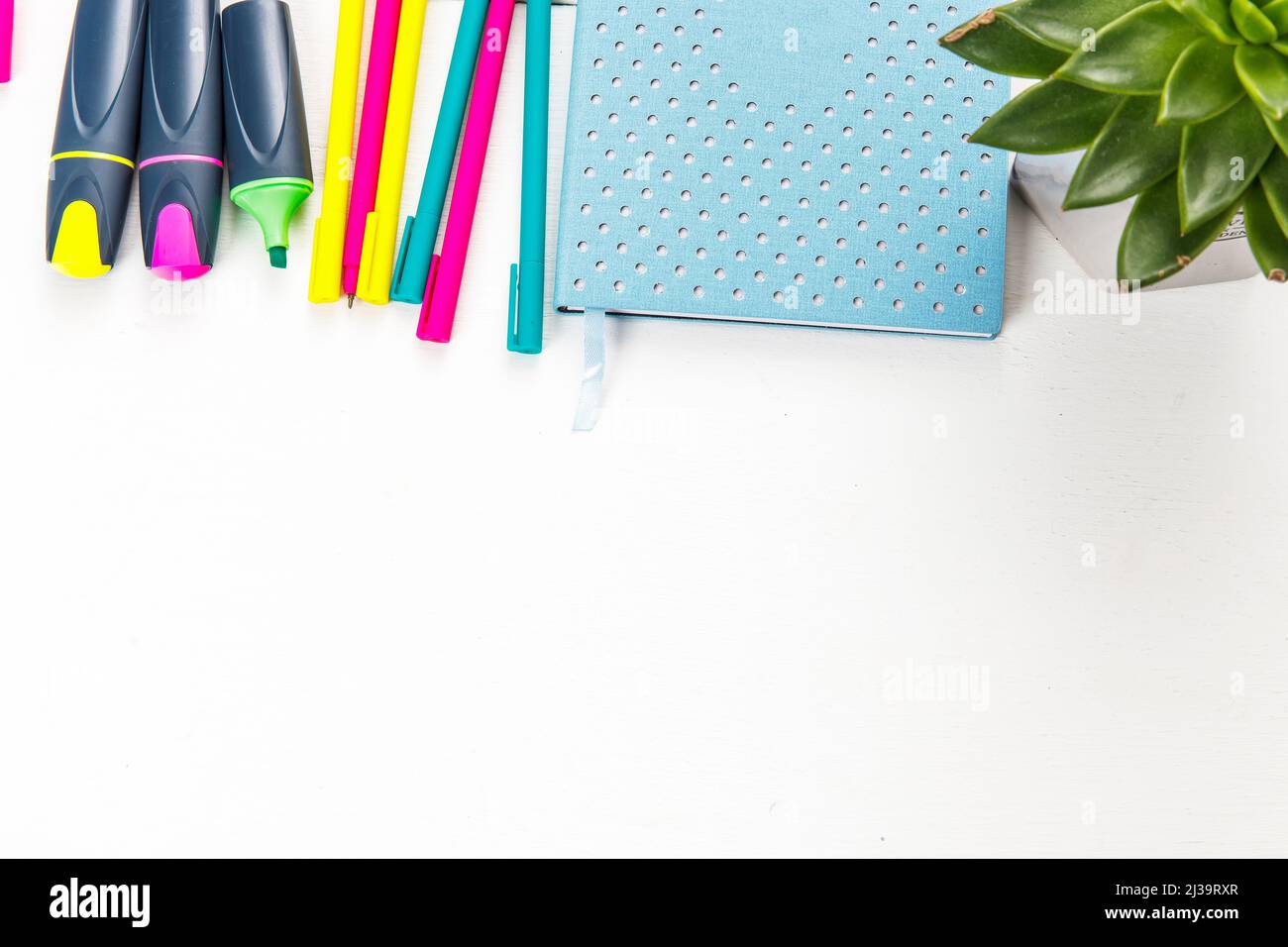 Layout for the office. Back to school. Blue notebook, colorful pens ...