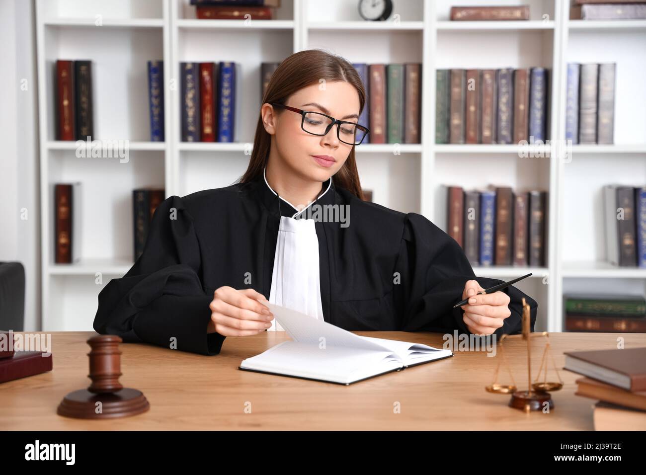 Female judge working in courtroom hi-res stock photography and images ...