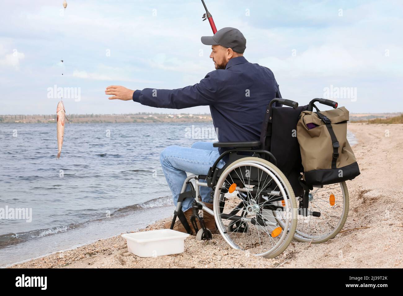 Wheelchair fishing hi-res stock photography and images - Alamy