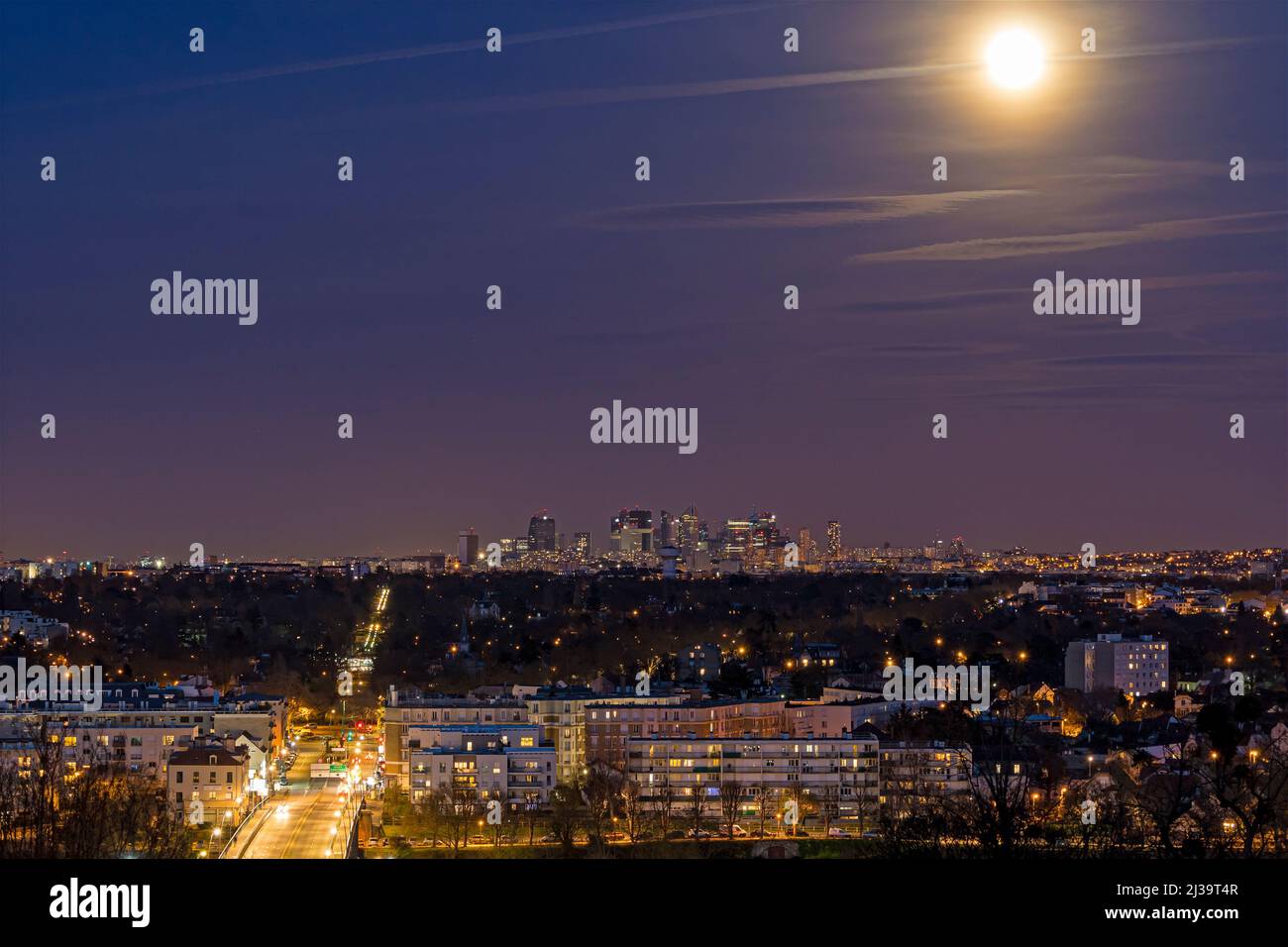 Blue and Purple Sky Over La Defense District at Night With Full Moon ...