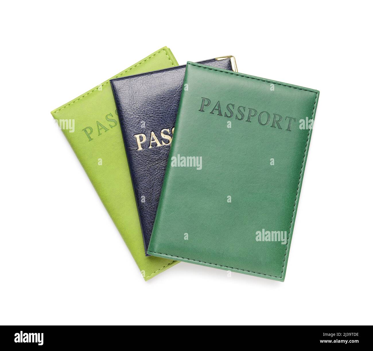 Different passports on white background Stock Photo - Alamy