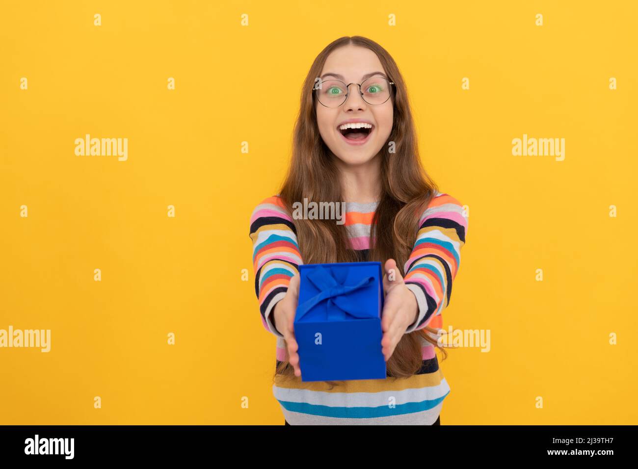 Child giving present hi-res stock photography and images - Alamy