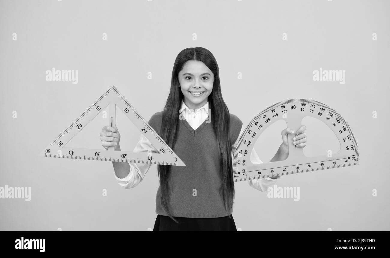 happy kid girl use protractor and triangle to learn mathematics ...