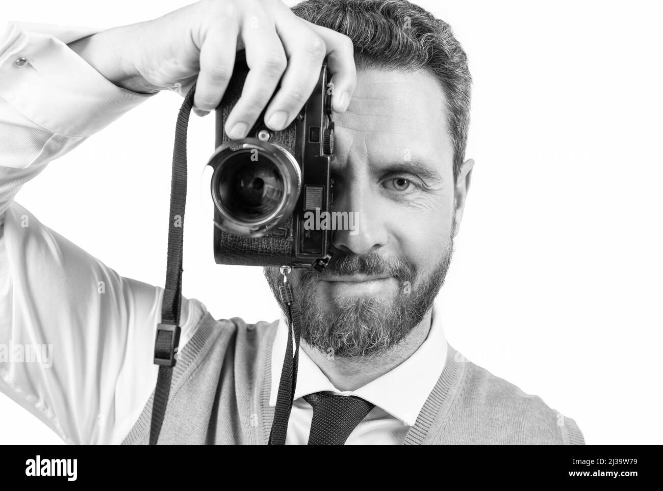 guy taking camera with retro camera isolated on white backdrop, copy ...