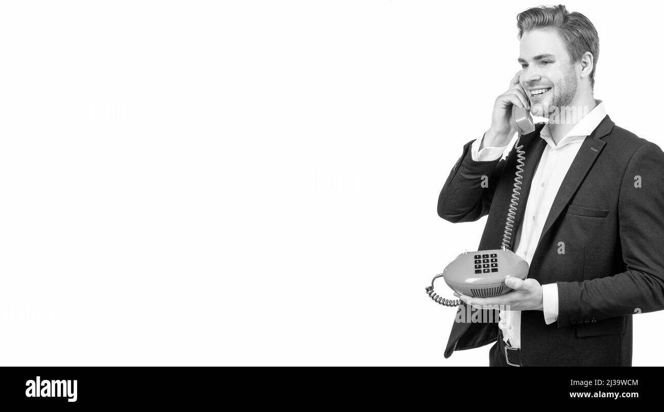 Happy professional man talk on old-fashioned vintage telephone call ...