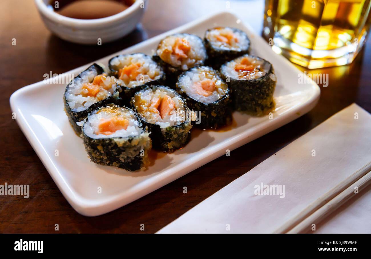 Fried maki rolls with salmon served soy sauce, japanese cuisine Stock ...