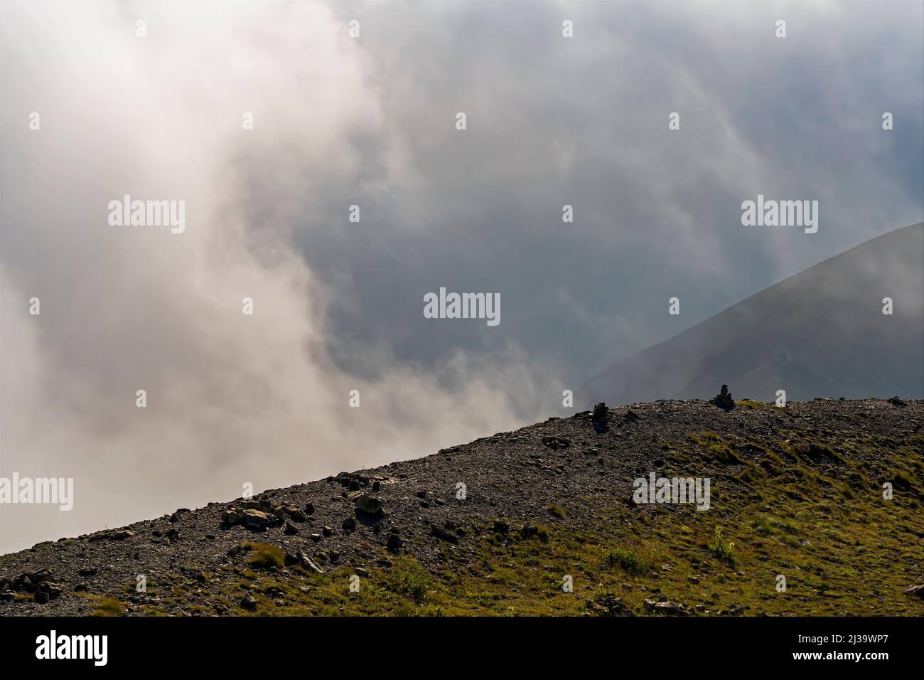Rocks and Grass in the French Alps Mountains With Mist at Sunny Morning ...
