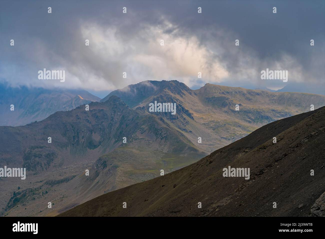Lunar Mountains at Sunset Covered by Moving Clouds Stock Photo - Alamy