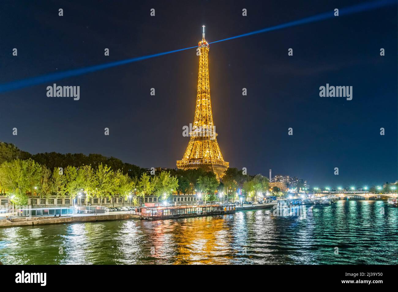 Eiffel Tower Illuminated at Night and Moonset Seine River and Cruises Paris Stock Photo - Alamy