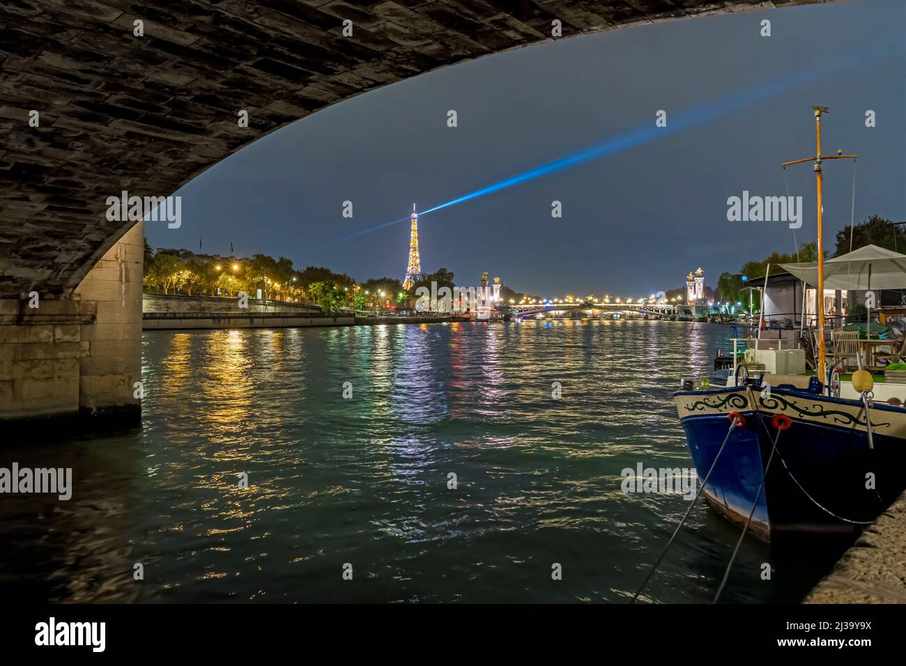 Peoples on Docks in Paris Touristic Center With Seine River and Bridge ...
