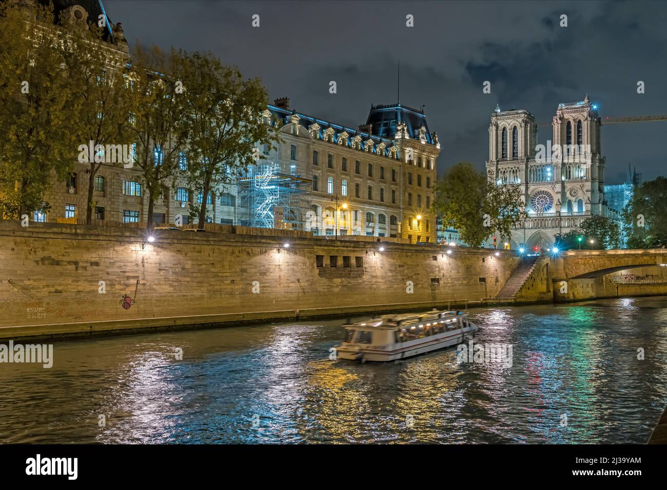 Romantic Scene in Paris at Night With Boat on Seine River Notre Dame ...