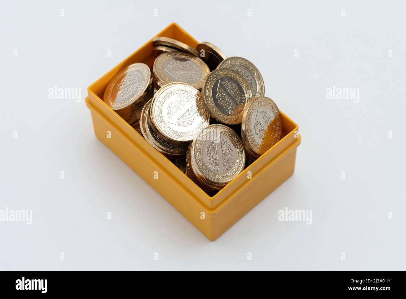 Stacks of Turkish One Lira coins on the white background Stock Photo ...