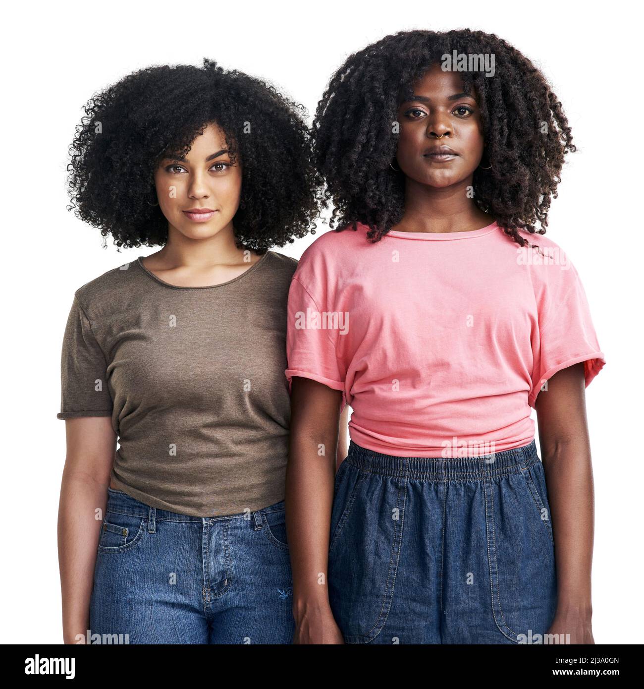 Two besties in a beautiful pod. Studio portrait of two attractive young ...