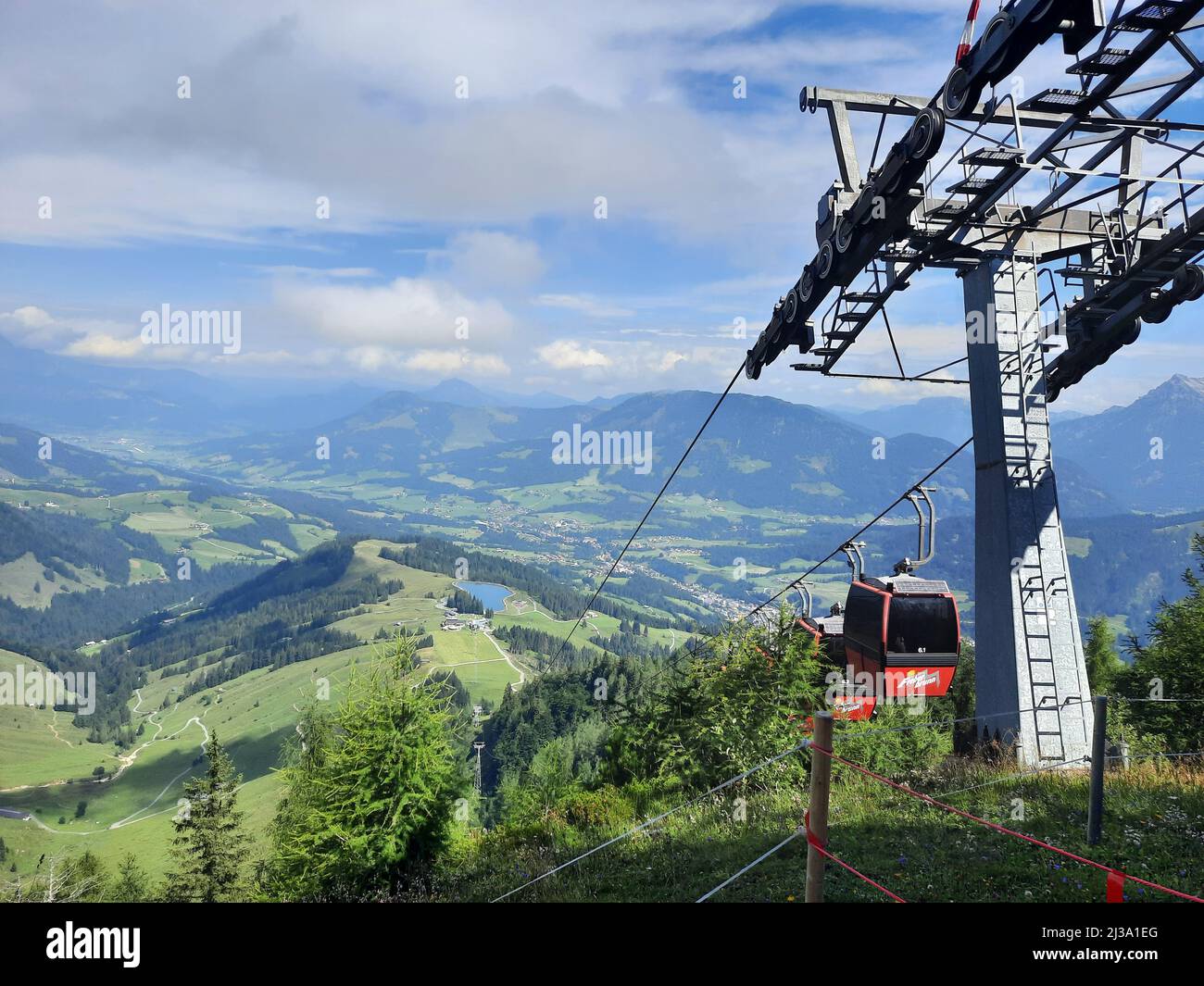 A perspective shot of a cable car road with a view of the landscape in ...
