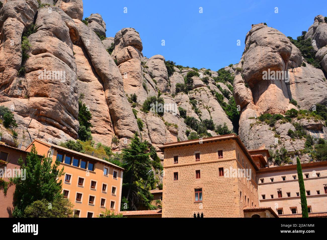 A perspective shot of the castle in Abbey of Montserrat in the daytime ...