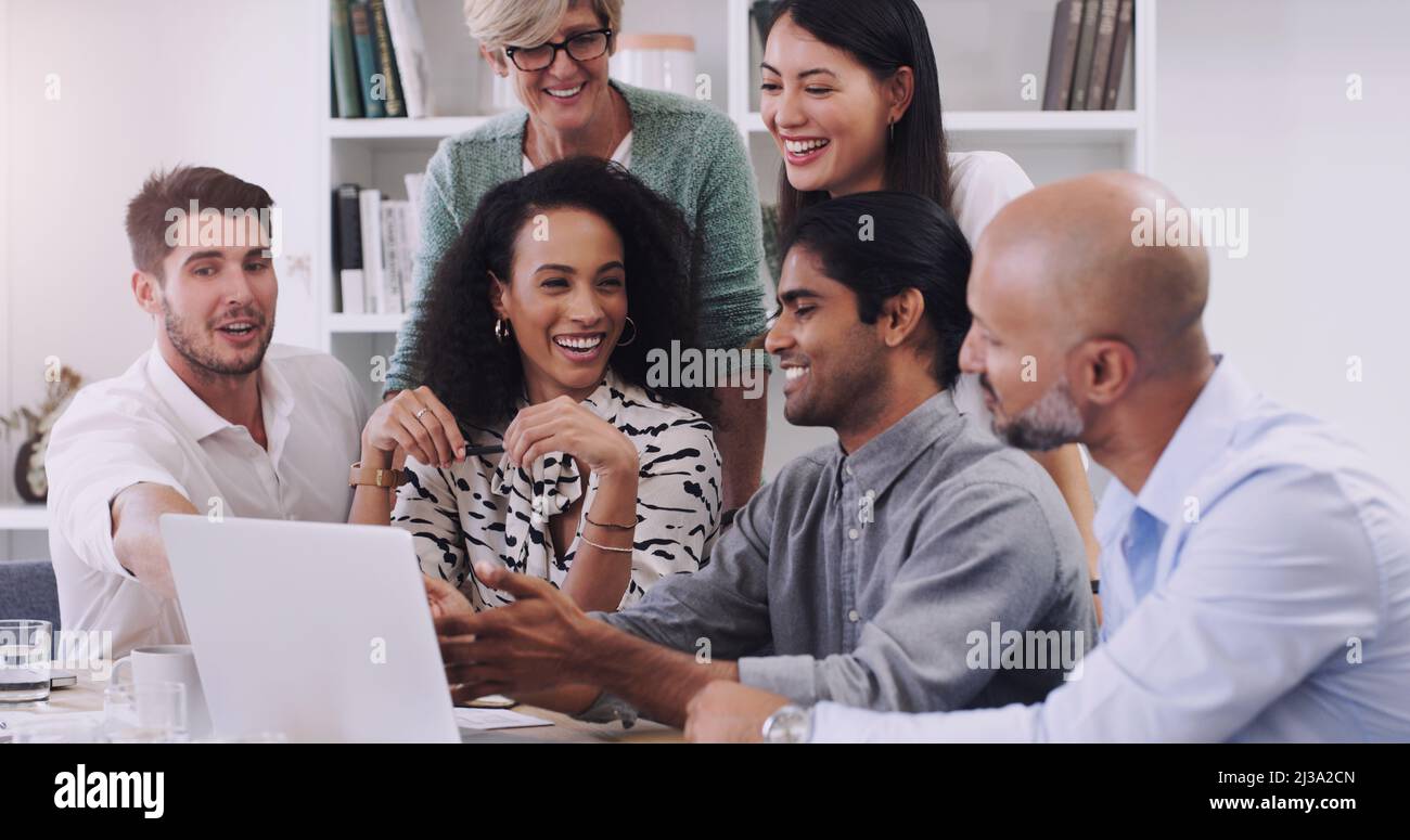 Teamwork has the power to inspire positive change. Shot of a group of ...