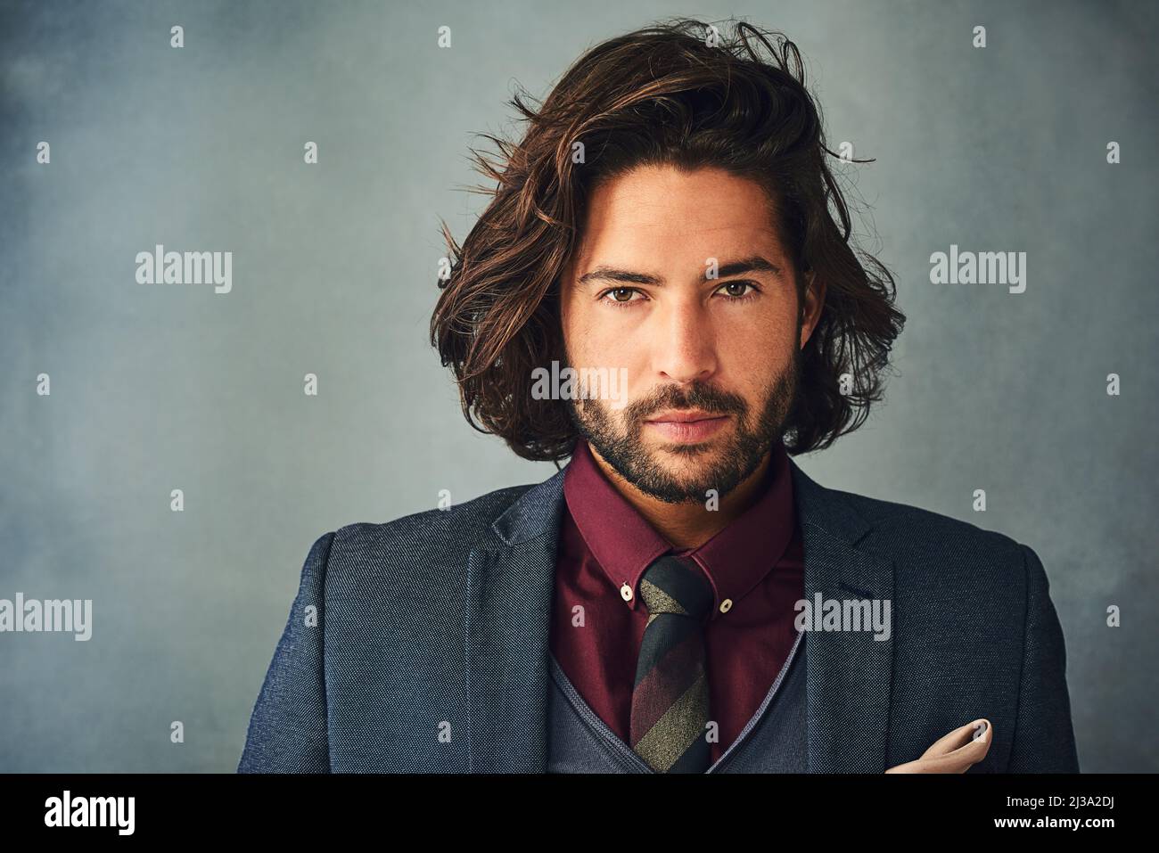 The rebirth of cool. Studio portrait of a stylishly dressed handsome ...