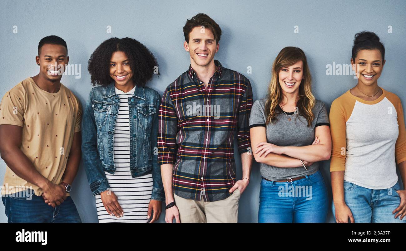 Good friends stand together. Studio portrait of a diverse group of ...
