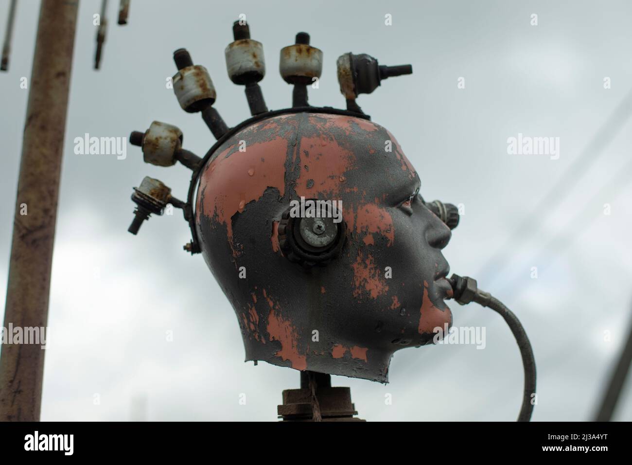 Punk mannequin. Plastic robot figure. Hose in your mouth. Steam punk ...