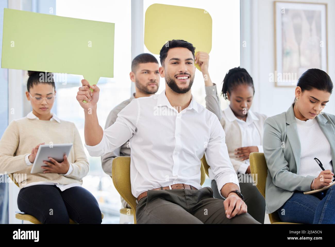 Everybodys got an opinion. Cropped shot of a group of young and diverse ...