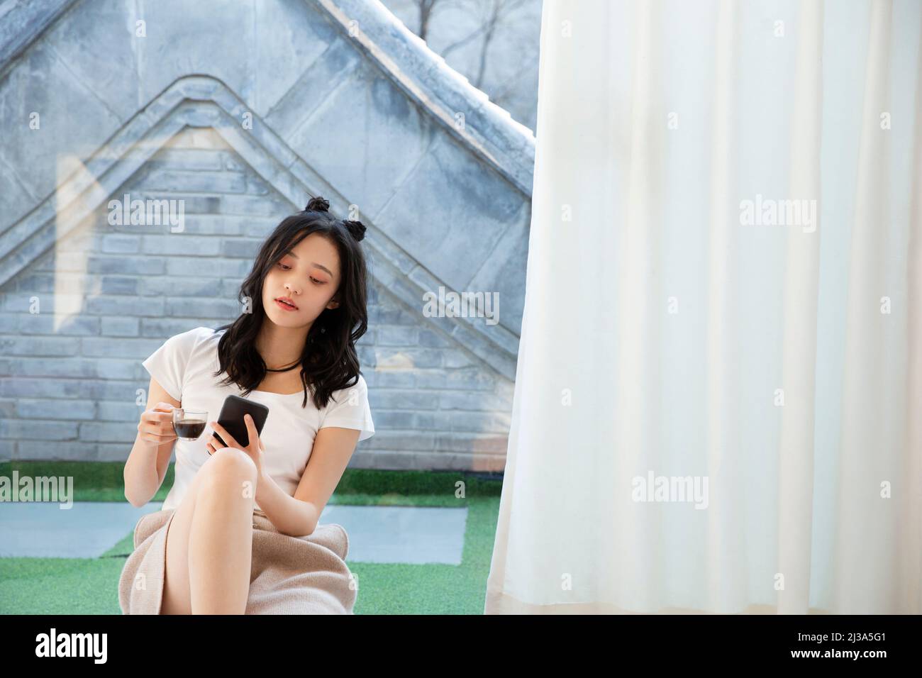 Chinese woman in shorts hi-res stock photography and images - Alamy