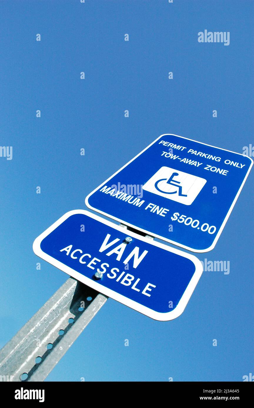 Van Accessible handicapped sign in parking lot for permit holders only ...