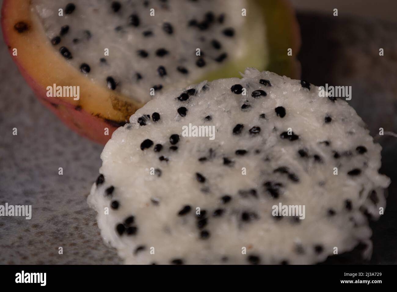 Close up of a delicious cactus fruit called prickly pear. White-fleshed ...