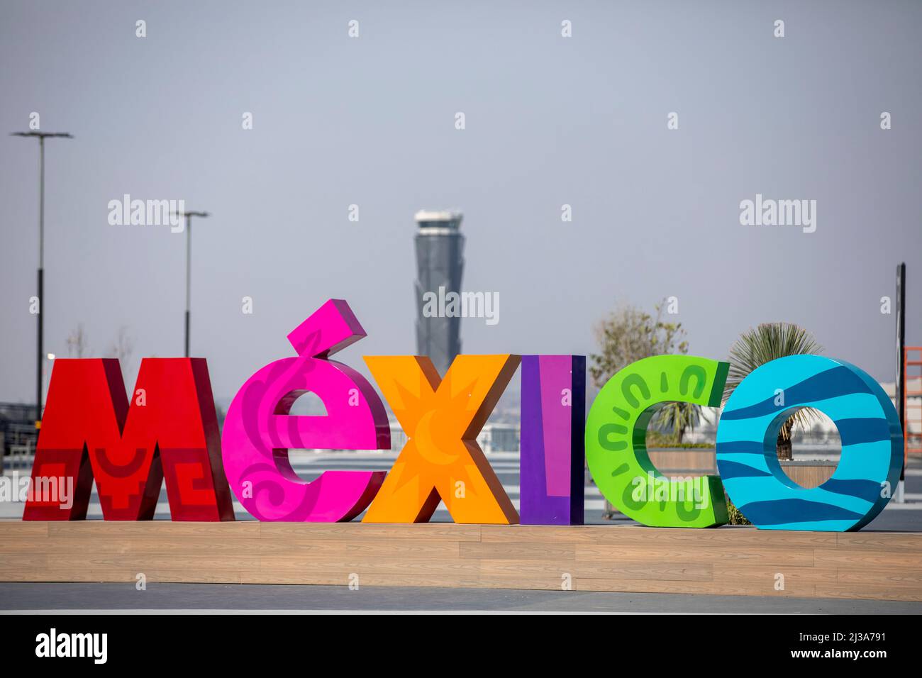 Letters signage with the Air Traffic Control Tower on the background ...
