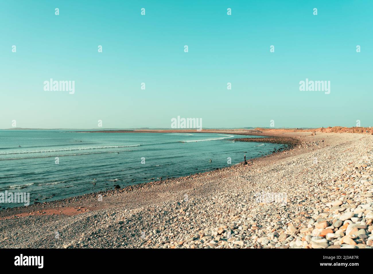 A natural view of the rocky beach in Strandhill, Ireland during ...