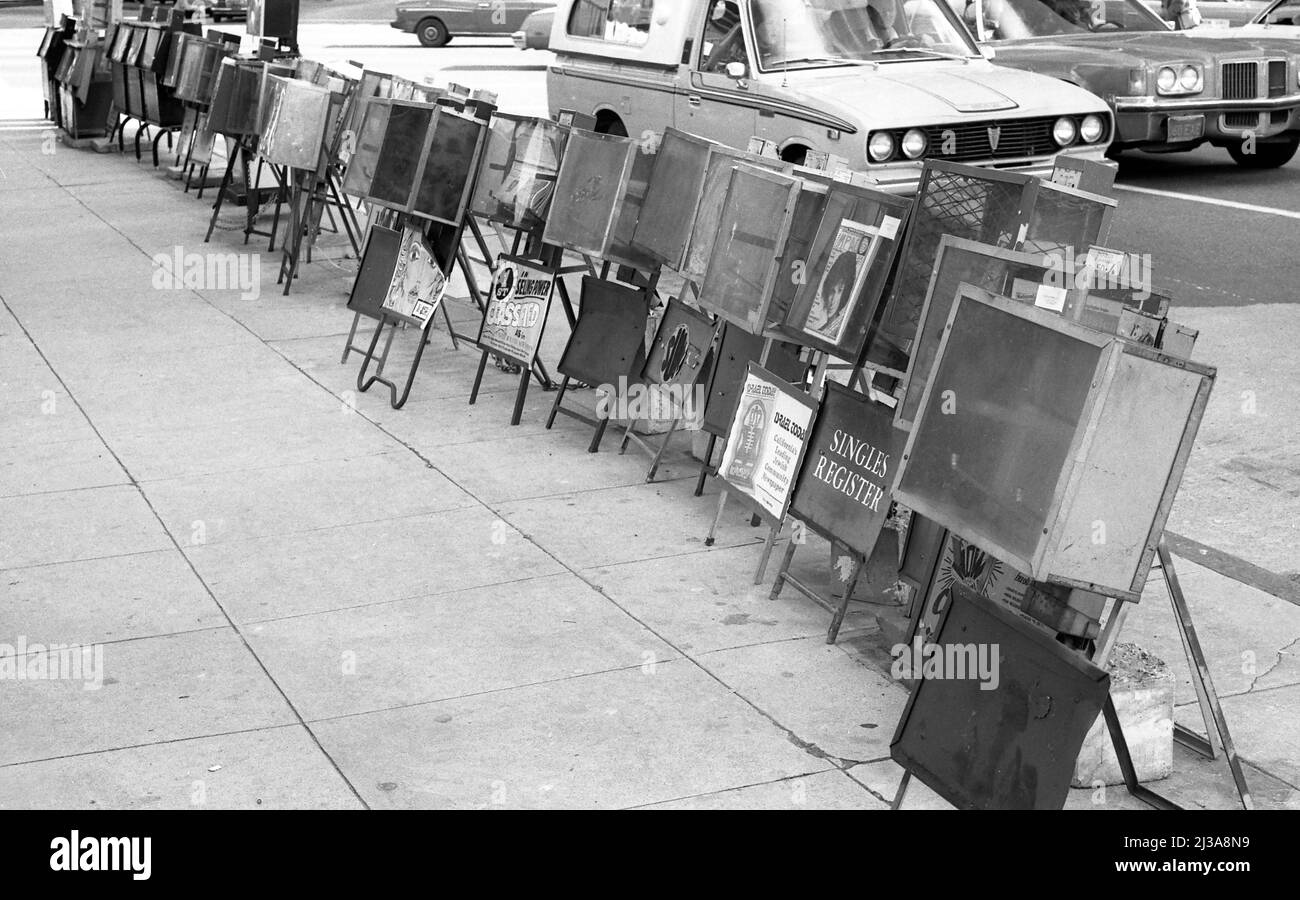 Newspaper vending boxes on a street corner in Los Angeles, California ...