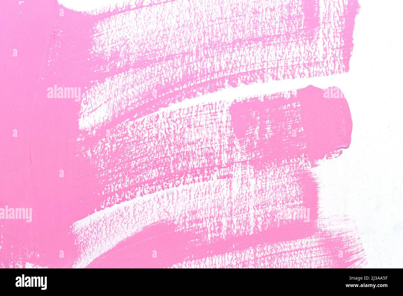 Pink pattern of color paint brush on the white wall for design in your ...