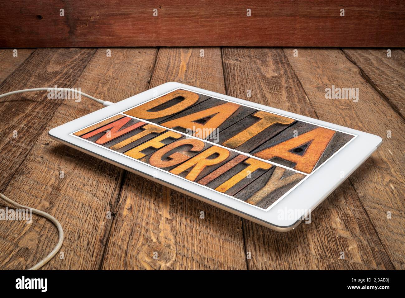 data integrity - word abstract in vintage letterpress wood type on a ...