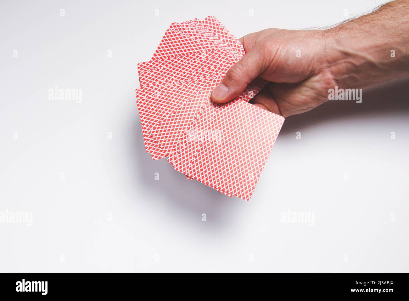 Hand playing cards close hi-res stock photography and images - Alamy