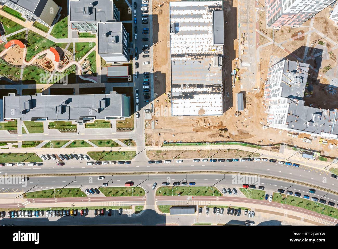 aerial top view of new residential district with multilevel parking ...