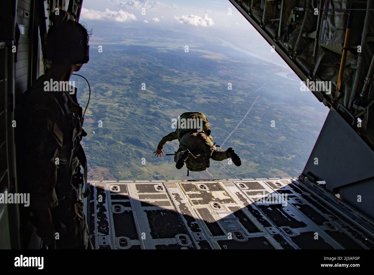 A Philippine Marine conducts a military freefall from a U.S. Air Force ...