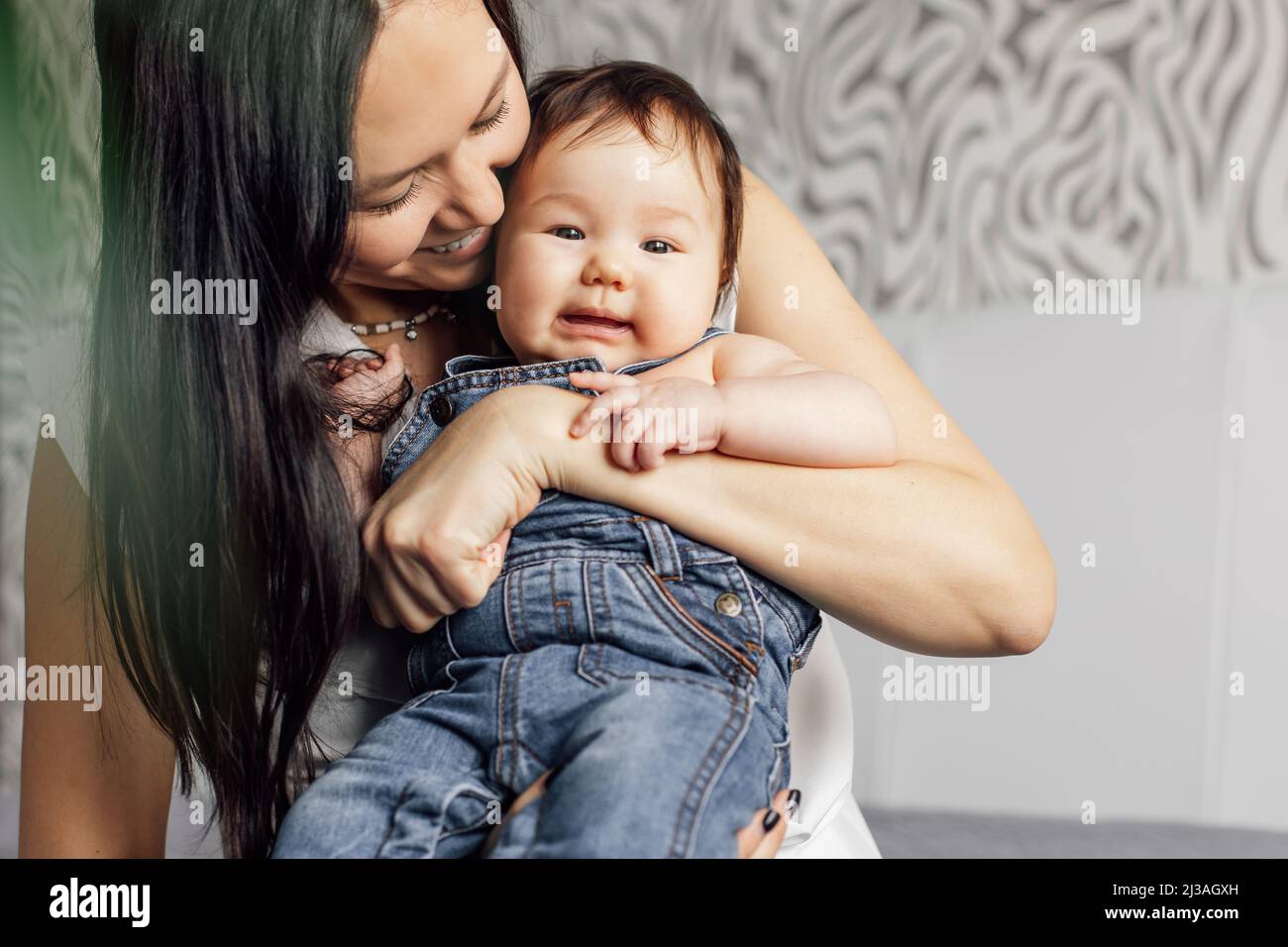 Portrait of happy mother with little daughter in bedroom closeup, free ...