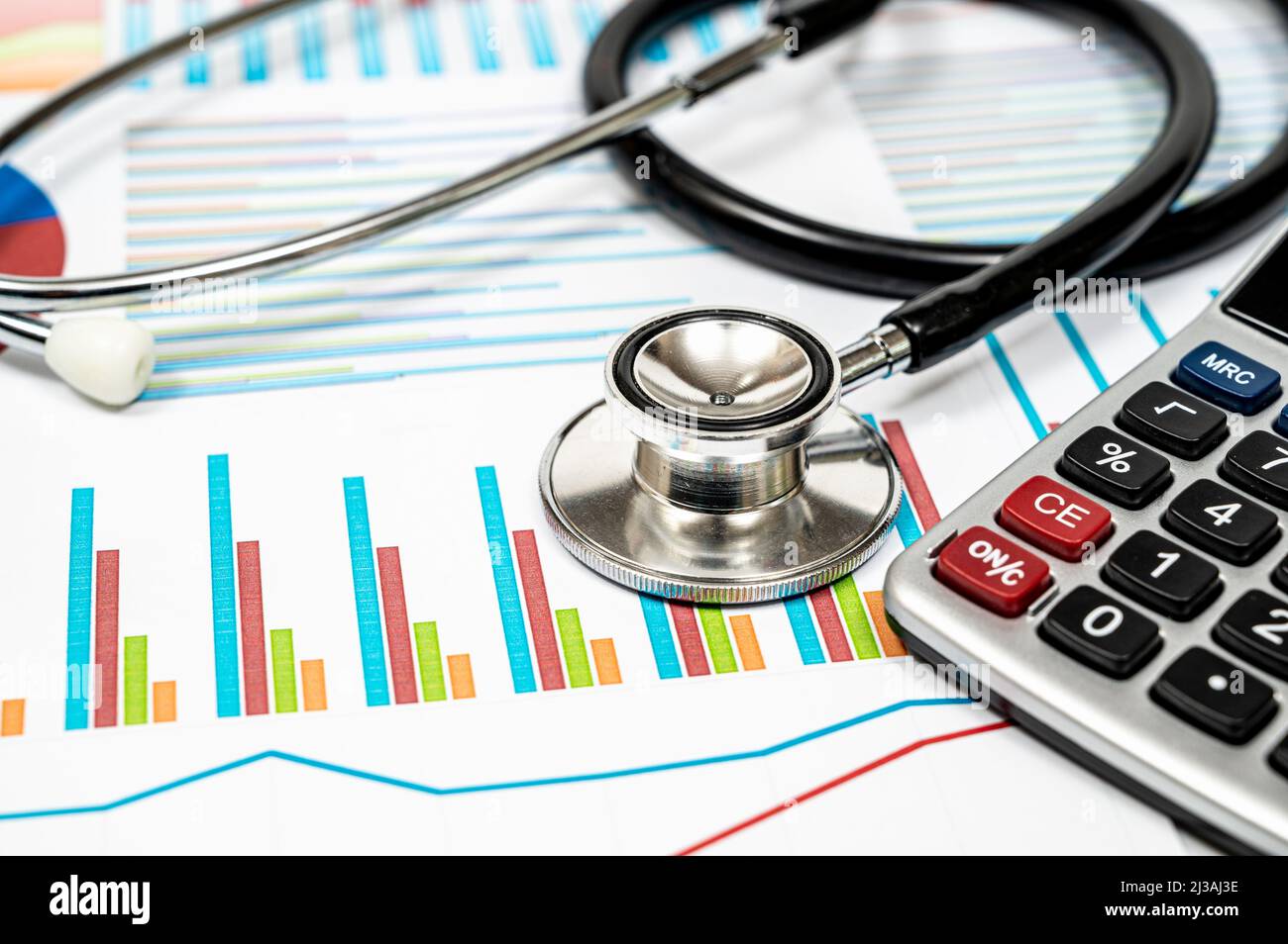 Medical concept background with several types of graphs and a ...
