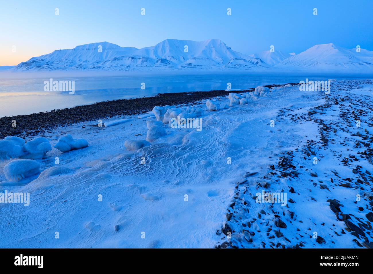 Winter Arctic. White snowy mountain, blue glacier Svalbard, Norway. Ice ...