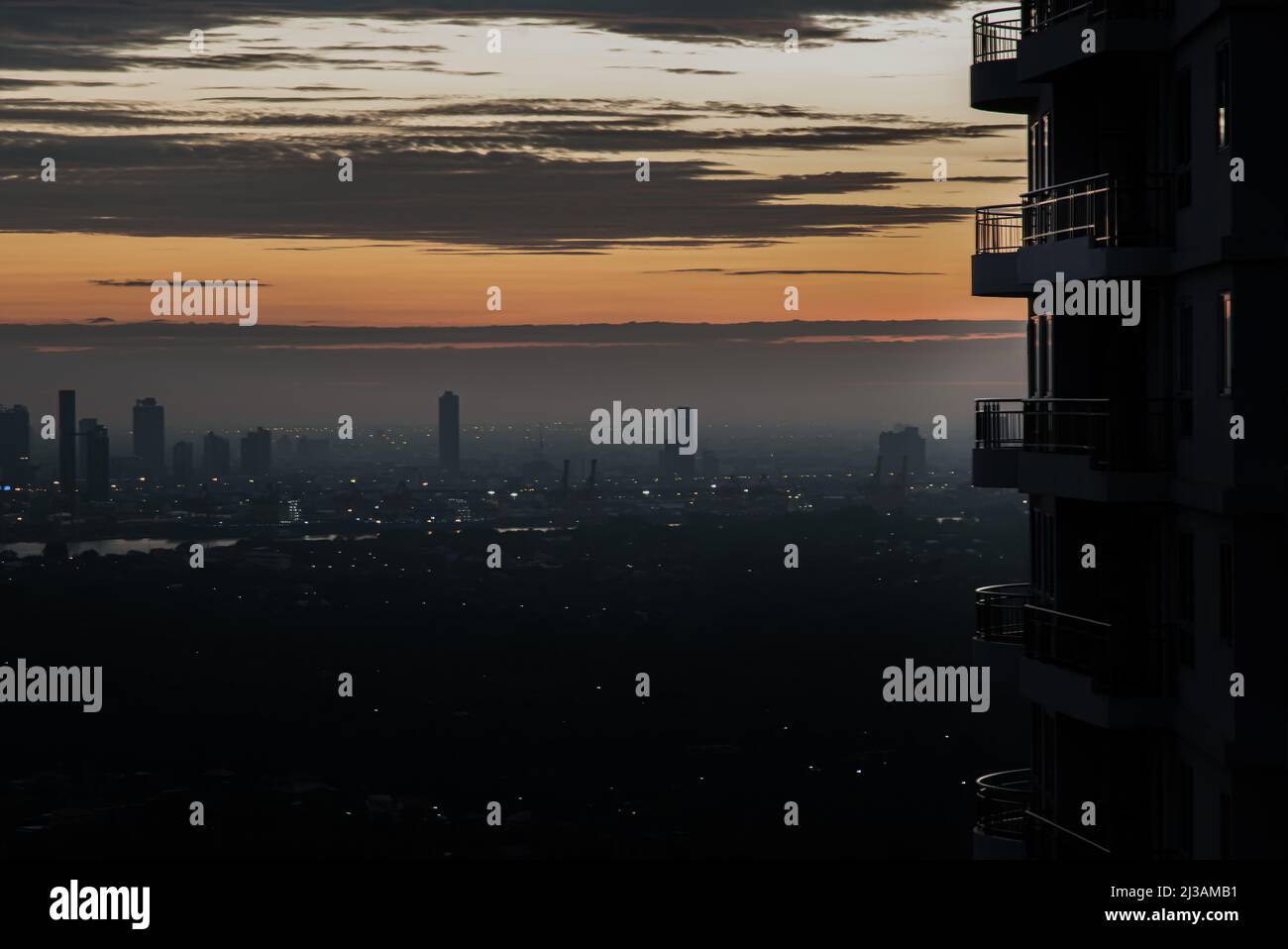 Gorgeous scenic of Residence balcony and Skyscraper on sunrise sky over ...